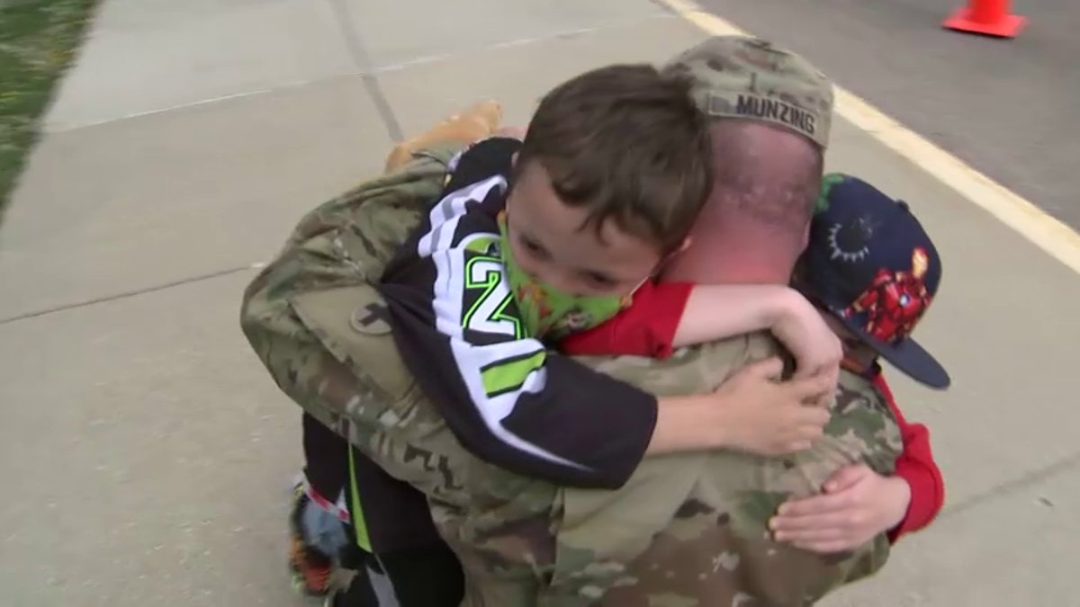 Heartwarming Military Family Reunion: Dad Surprises Sons at Deerfield ...