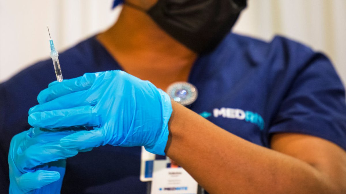 COVID Booster Shot Eligibility in Illinois: What to Know After Latest ...