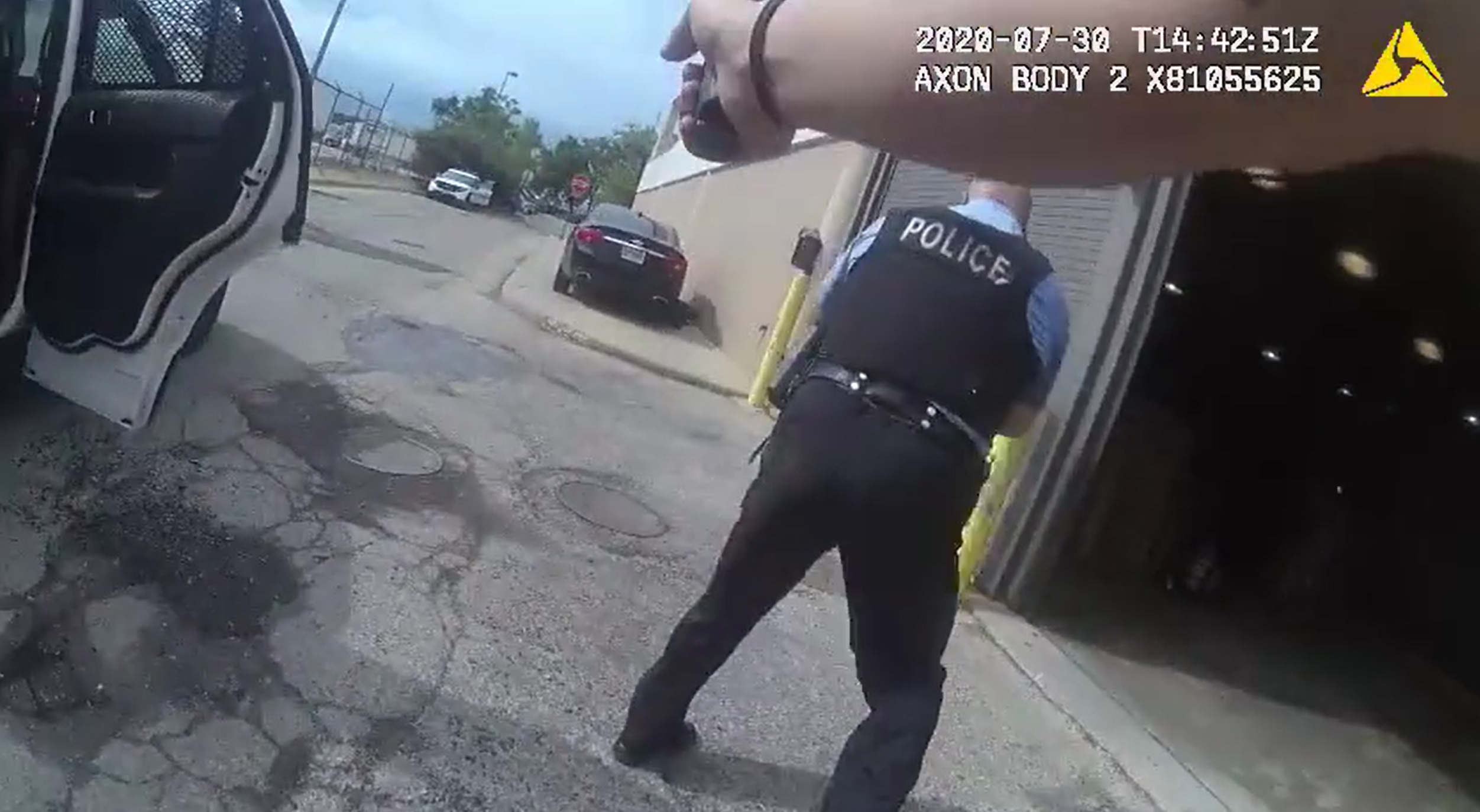 Newly Released Video Shows Harrowing Gun Battle Outside Chicago Police ...