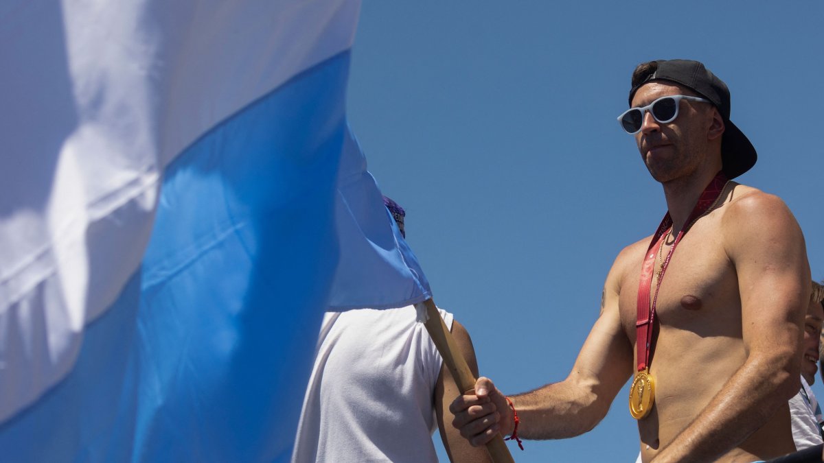 Emiliano Martinez Holds Baby Doll With Kylian Mbappe's Face in ...