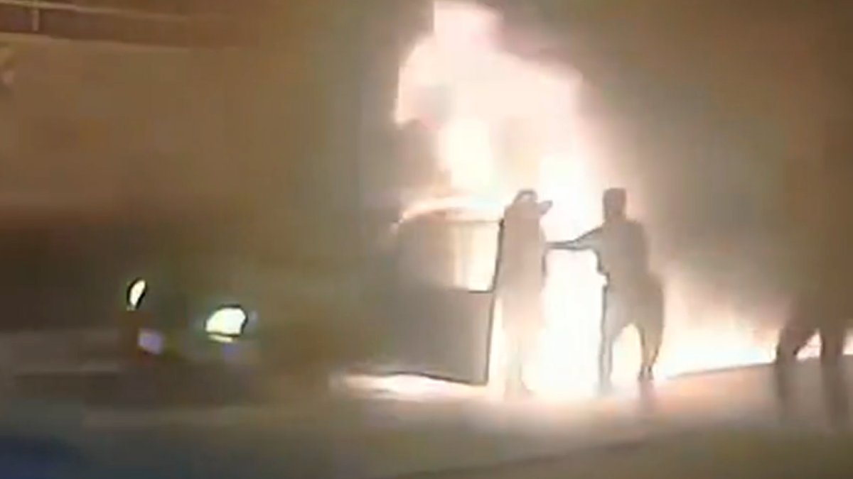 Wild Video Shows Police Officer Rescuing Elderly Driver From Car ...