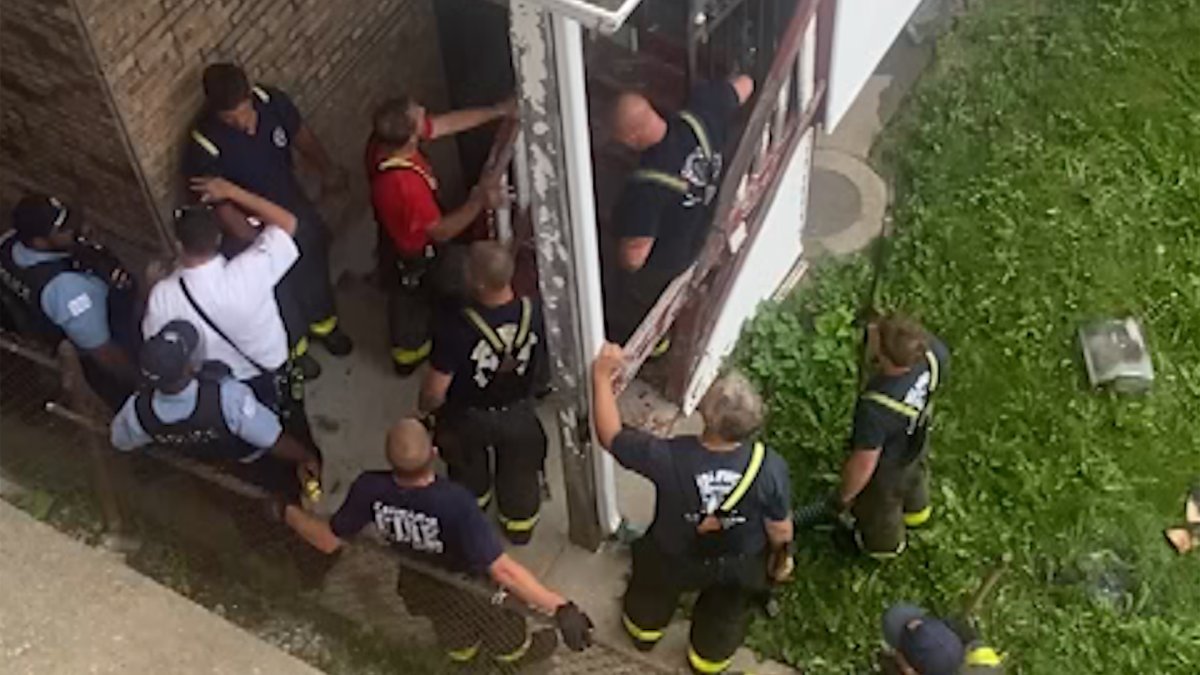 Chaotic scene as 2 Chicago firefighters lured into home, held at ...