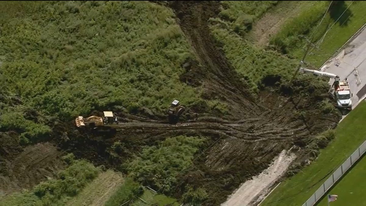 Landslides at suburban landfill as Heavy Rain and Flooding Hit Cook ...