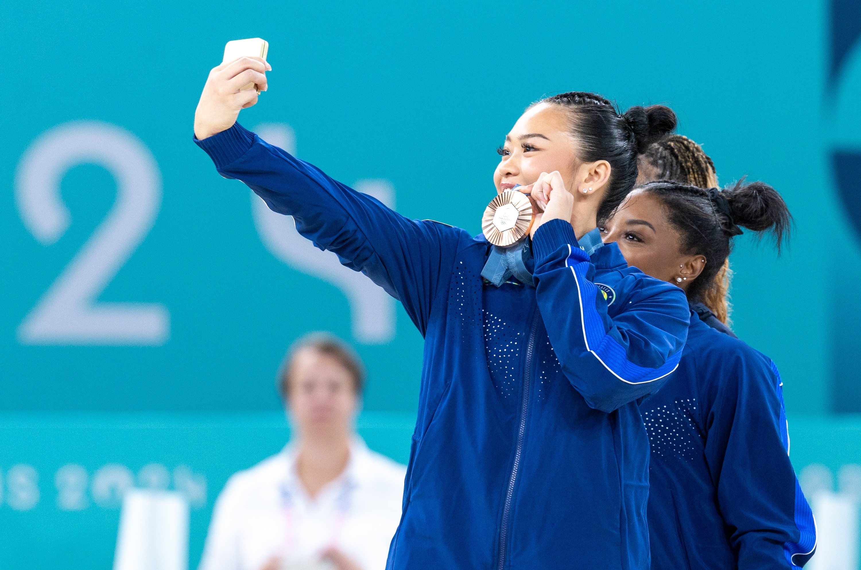 Suni Lee’s long road back to Olympics ends on medal stand – NBC Chicago