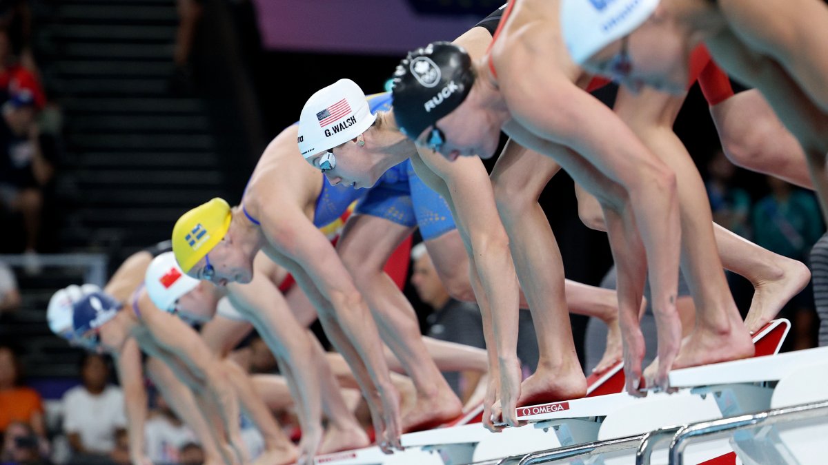 Why do swimmers wear 2 caps? The reason behind the look – NBC Chicago