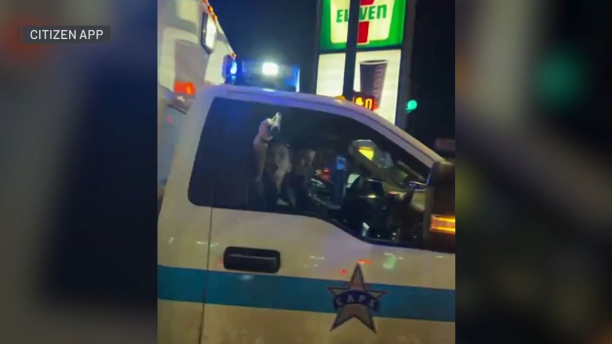 Video appears to show Chicago officer point gun at street takeover ...