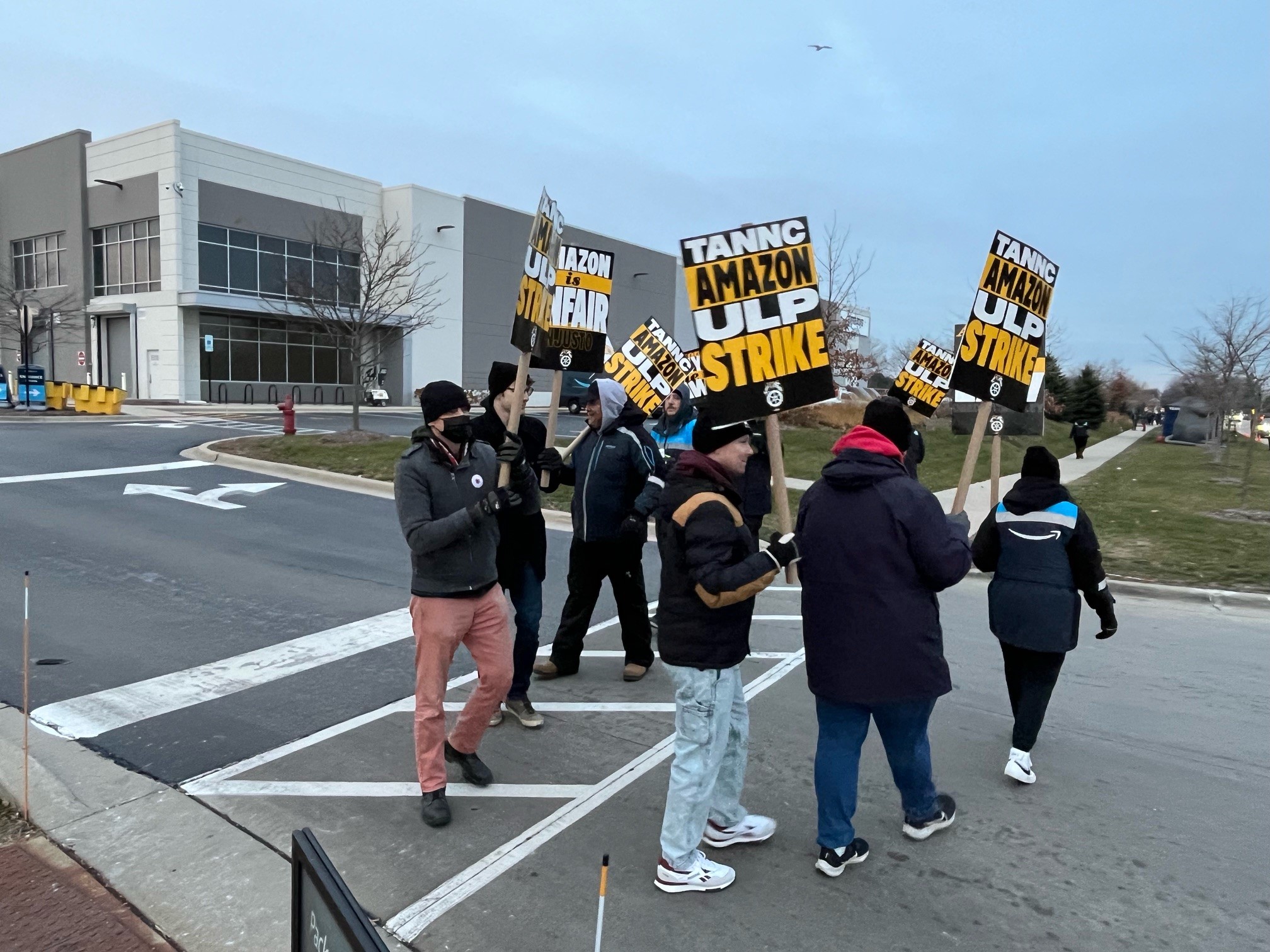 Amazon strike: Workers in Skokie walk off job during shipping season ...