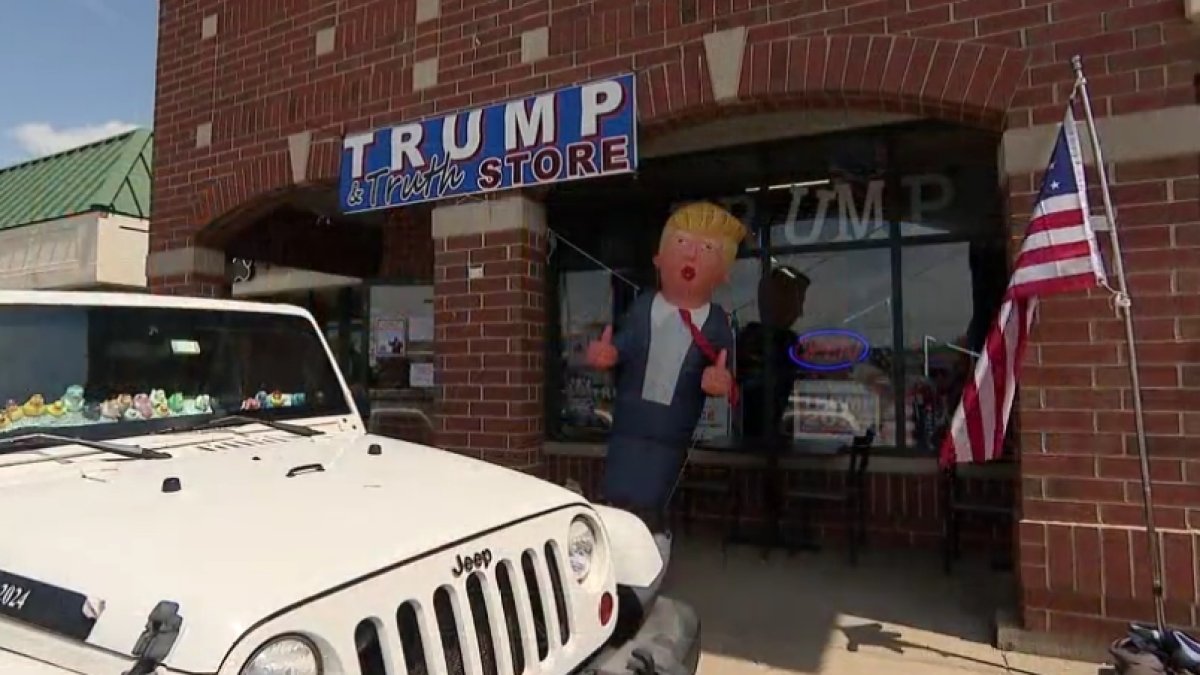 Owner of Trump souvenir shop says she is being targeted – NBC Chicago