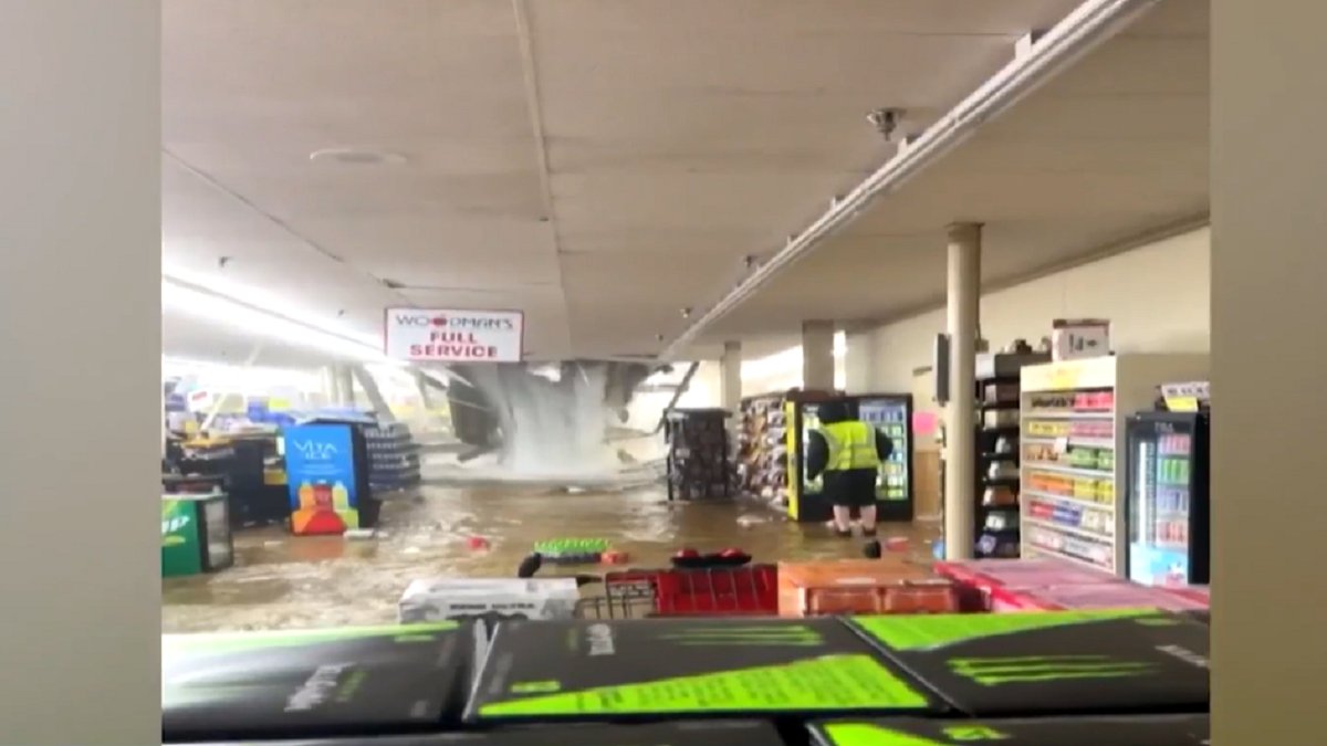 Waterfall pours into popular grocery store in Madison after roof ...