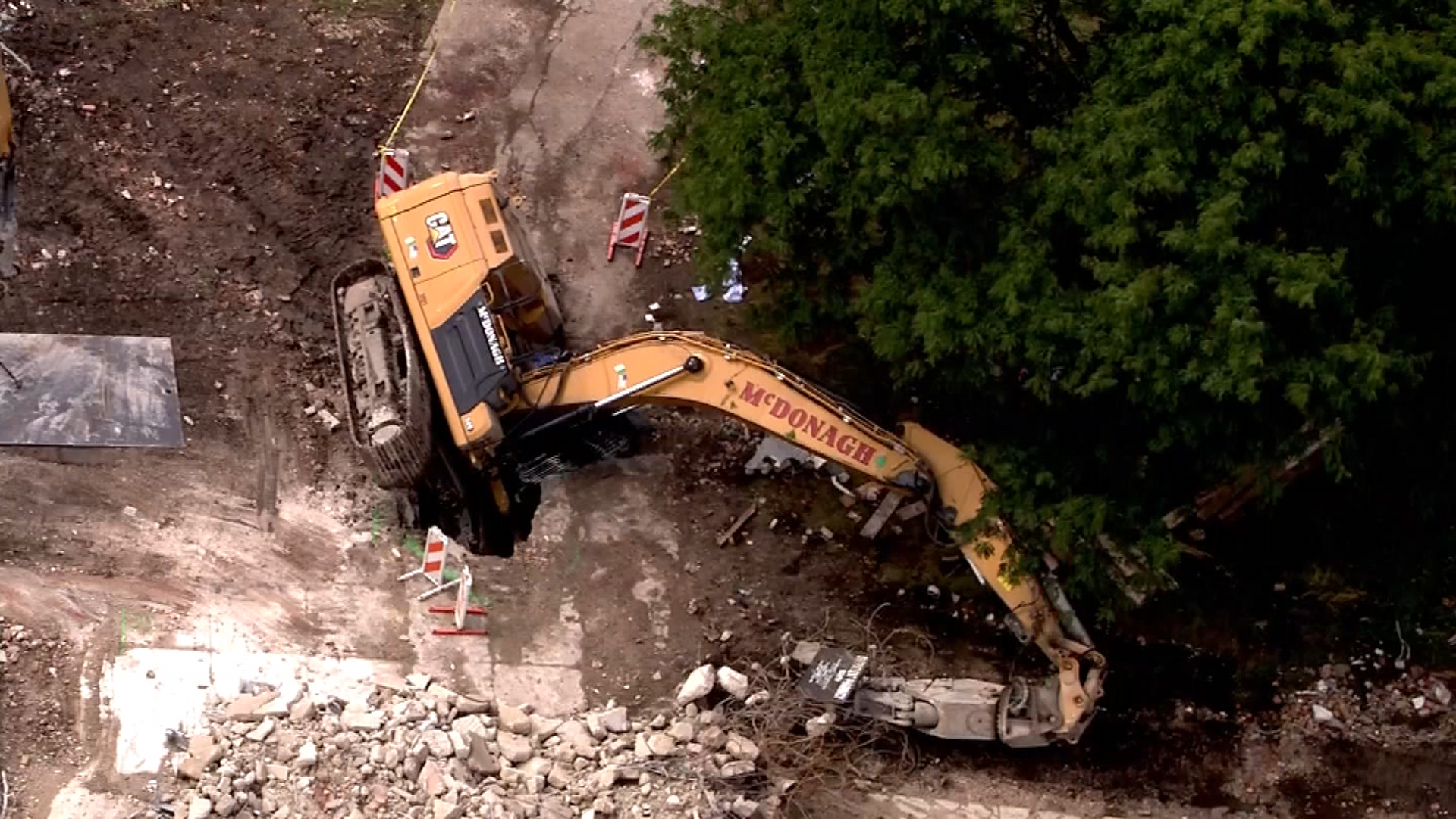 Person trapped inside fallen crane at Oak Forest construction site ...
