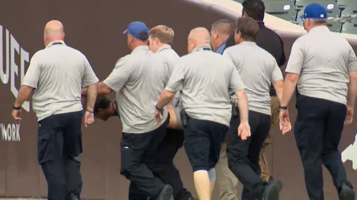 Video: Man detained, carried out of Wrigley Field by security – NBC Chicago
